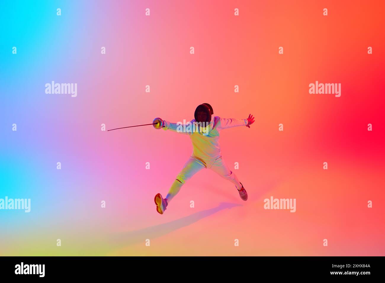 Fencer in full white attire, including mask, depicted mid-lunge with ...