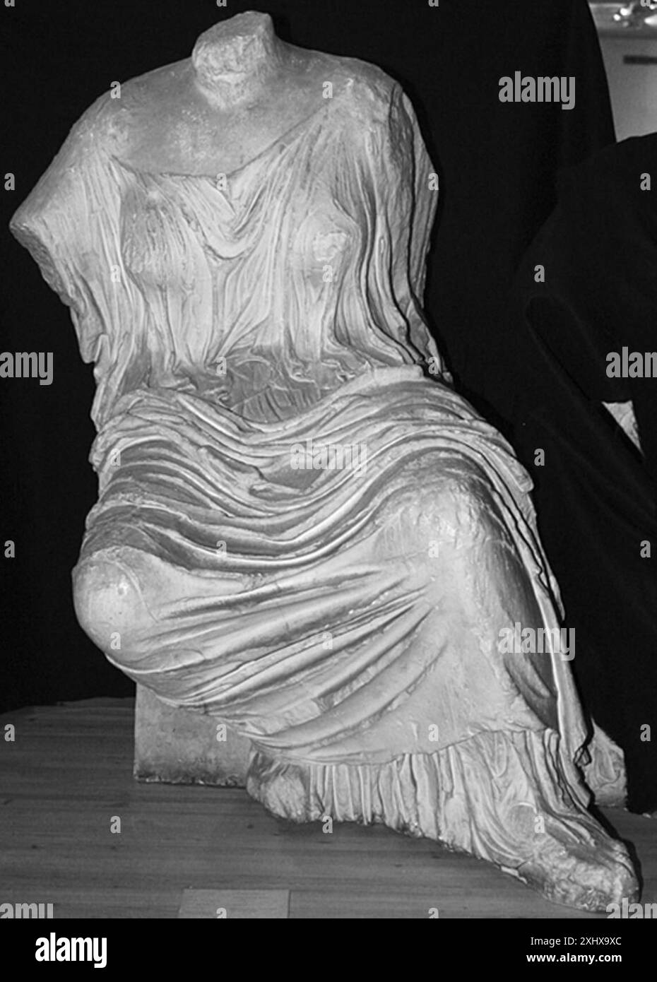 This statue depicts a seated woman, possibly representing the goddess ...