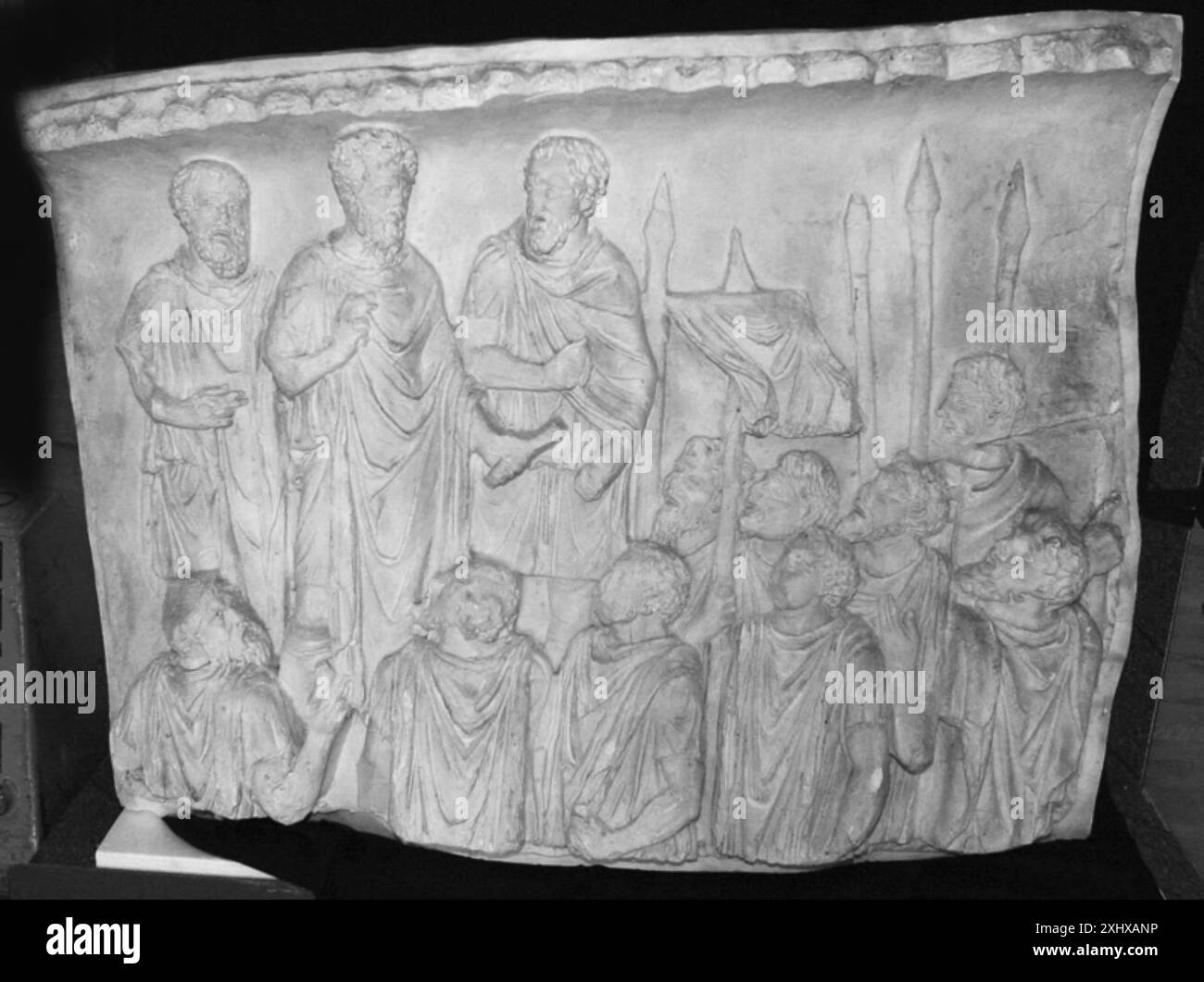 A relief depicting Roman soldiers escorting female prisoners, showing ...