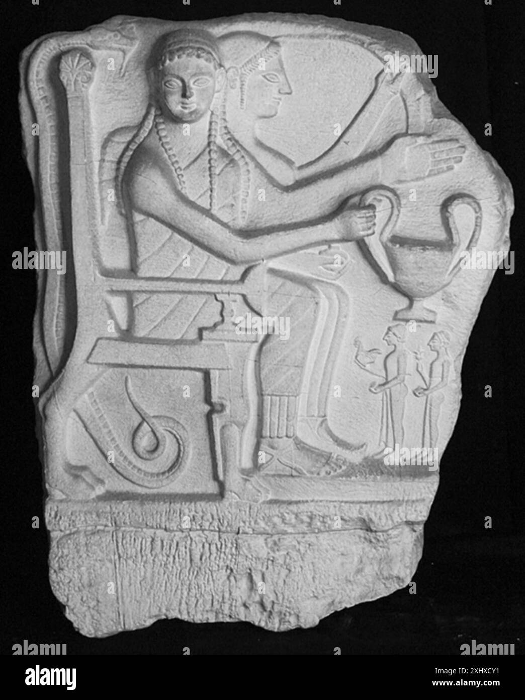 Grave Relief. Two people throne against h. With two small worshipers in ...