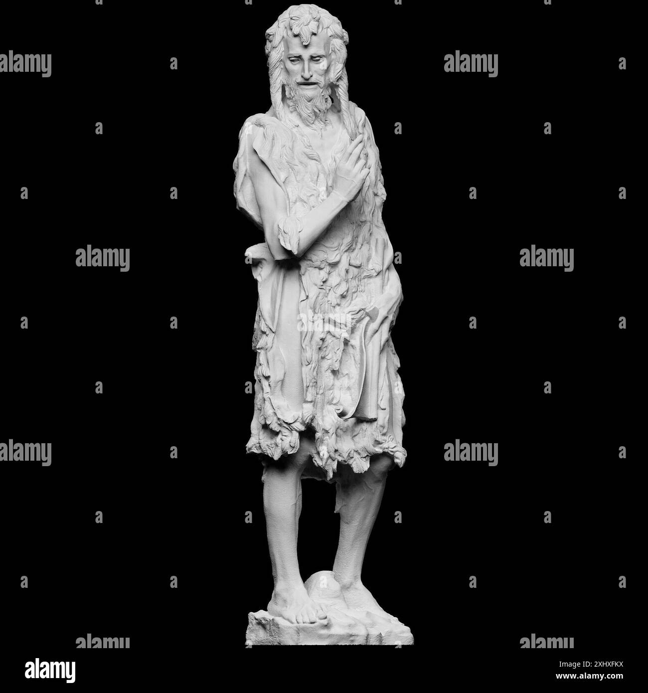 Statue representing John the Baptist, depicting the biblical figure in ...