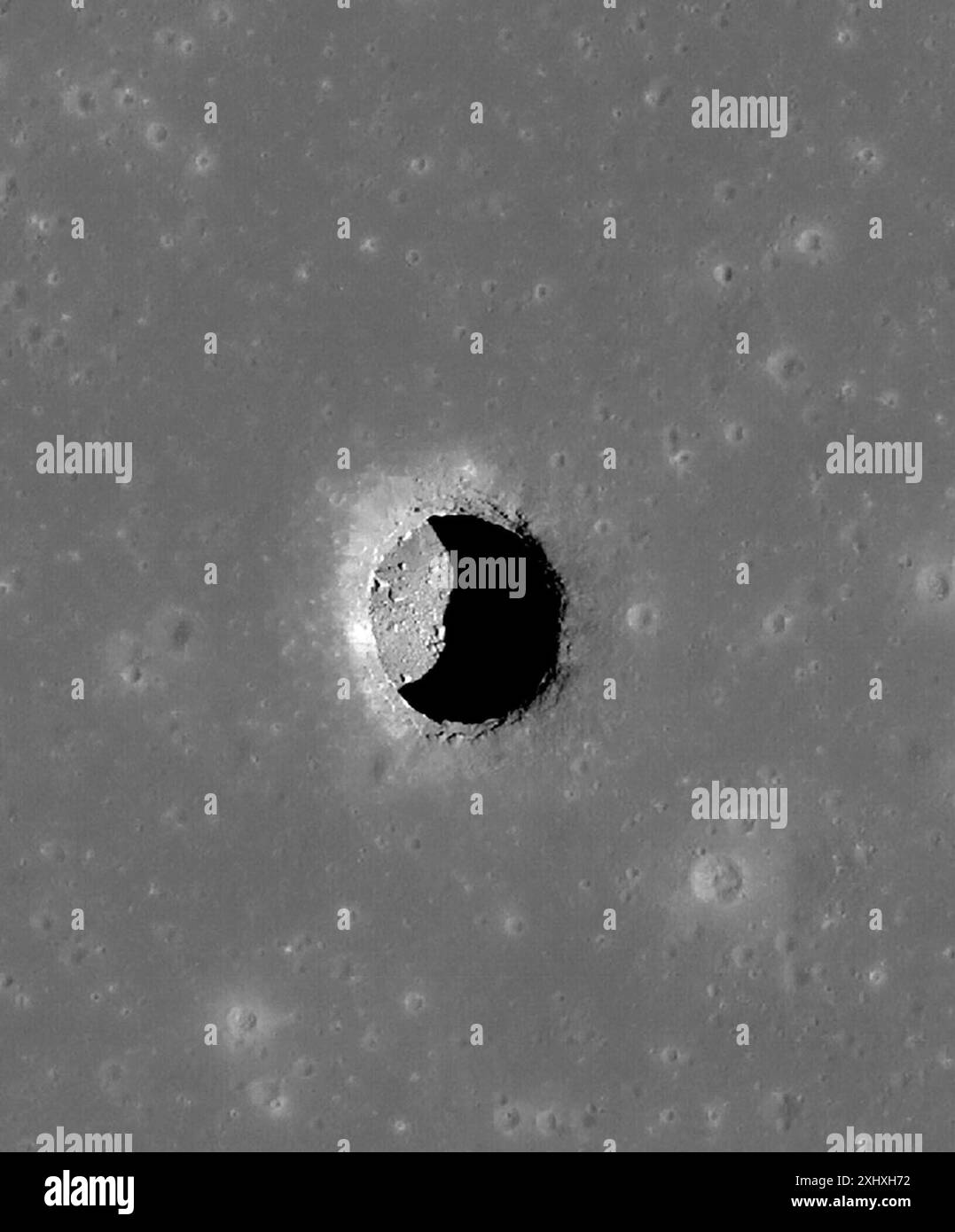 Hand out photo shows the Mare Tranquillitatis pit as seen by NASA's ...
