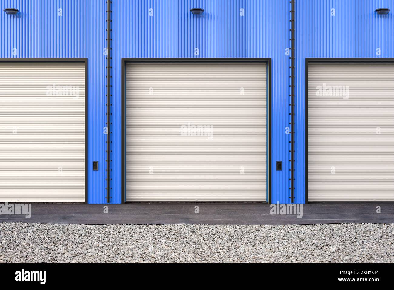 3d rendering blue warehouse exterior with shutter doors Stock Photo - Alamy