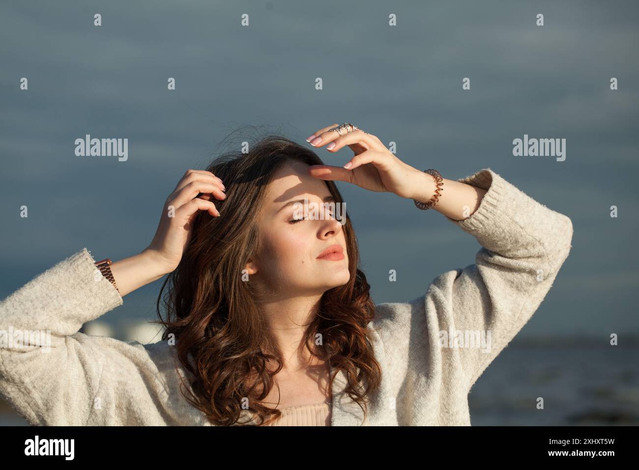 Resting healthy brunette woman with long hairstyle and fresh skin ...