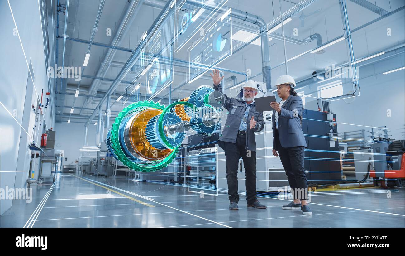 Factory Digitalization: Two Industrial Engineers Use a Tablet Computer ...