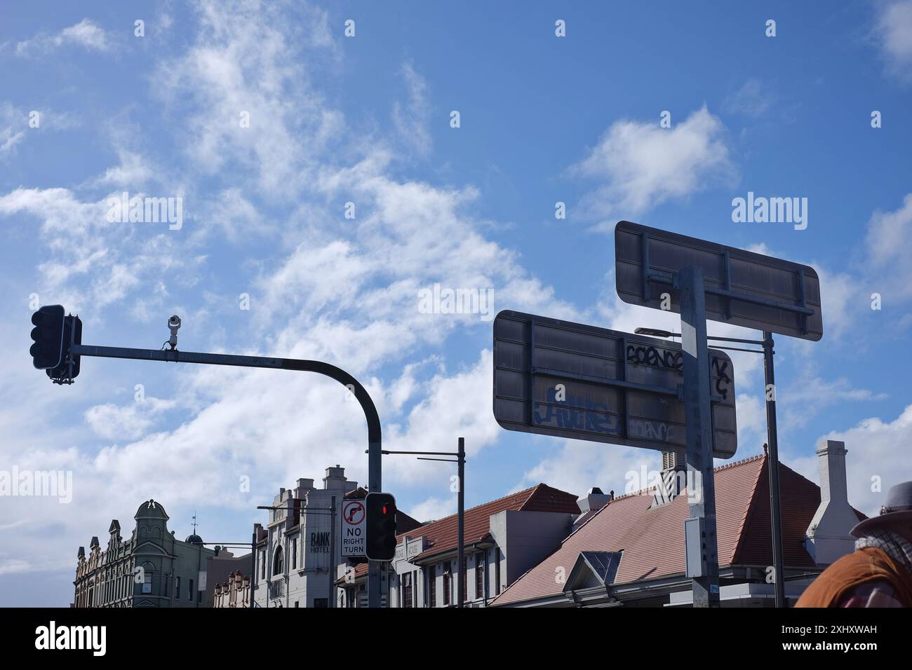 Signs and clouds over King Street, Newtown Train Station, Bank Hotel ...