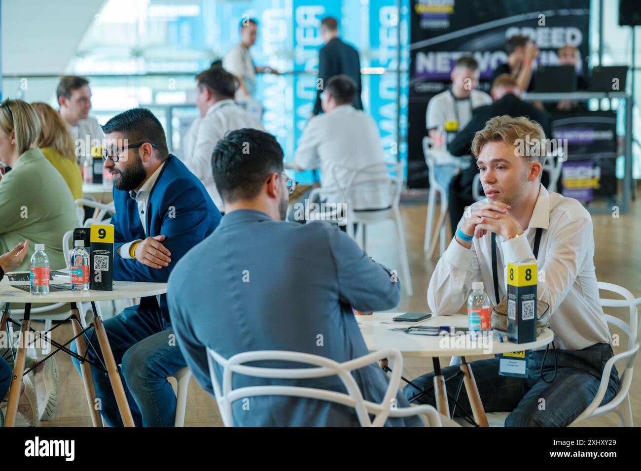 Moscow - April 10,2024: Professionals networking and engaging in ...
