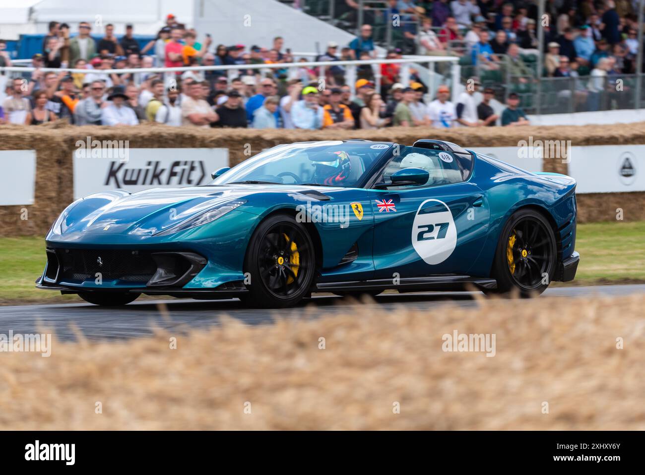 2023 Ferrari 812 Competizione A driving up the hill climb track at the ...