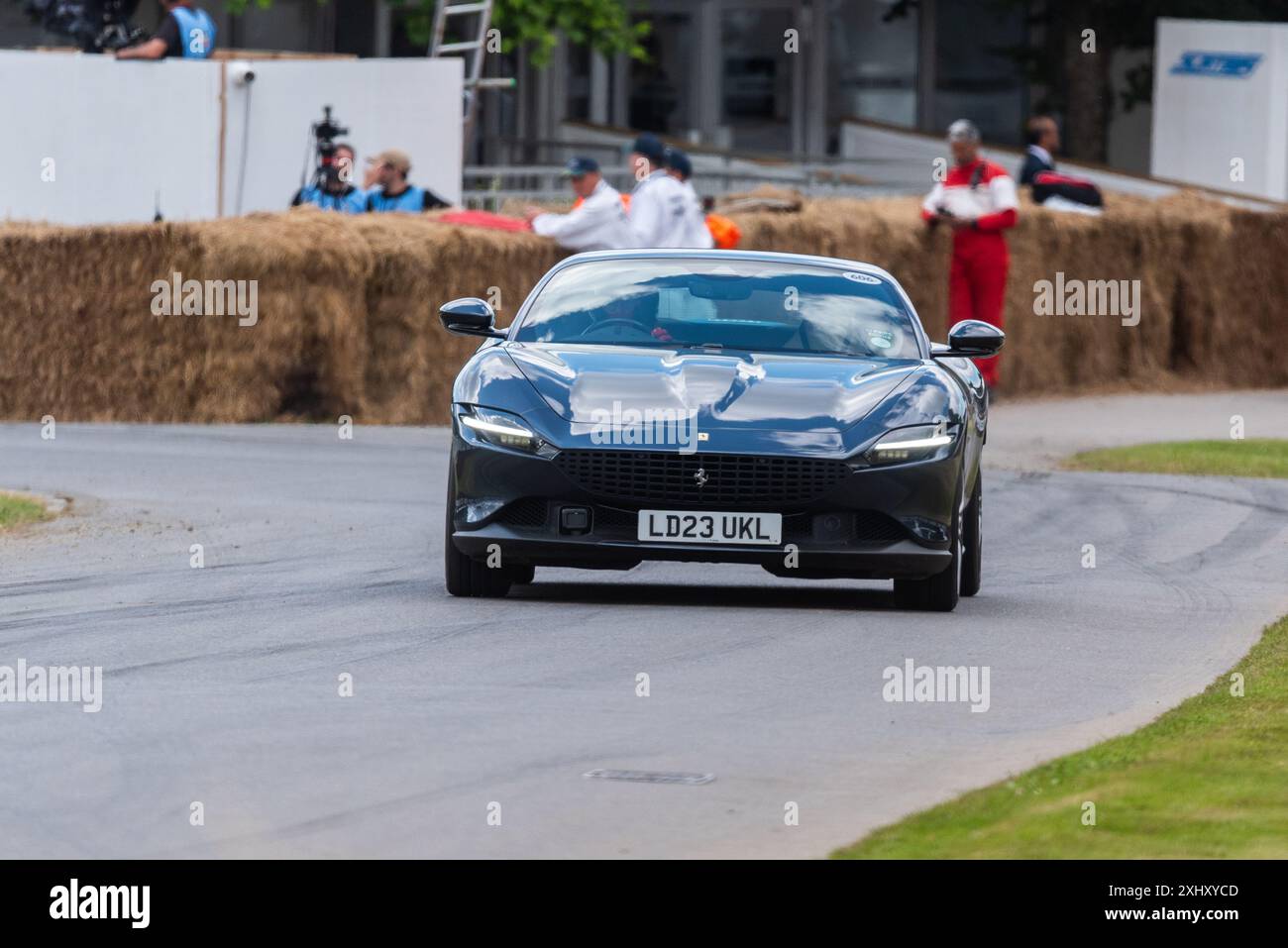 2023 Ferrari Roma S-A Coupe car driving up the hill climb track at the ...