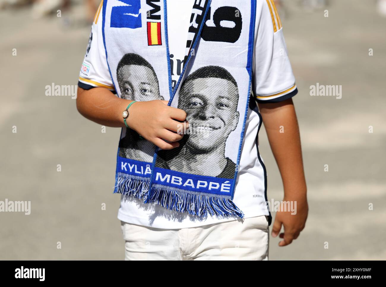 A scarf on a Real Madrid fan outside the stadium before the unveiling ...