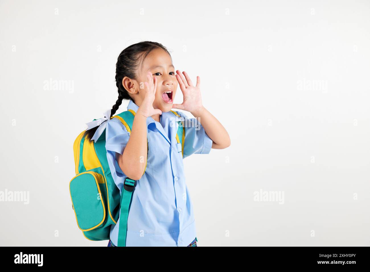 Portrait smile Asian little girl kindergarten hold hands open mouth ...