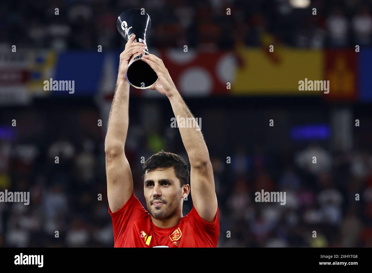BERLIN - Rodri of Spain with player of the tournament cup during the ...