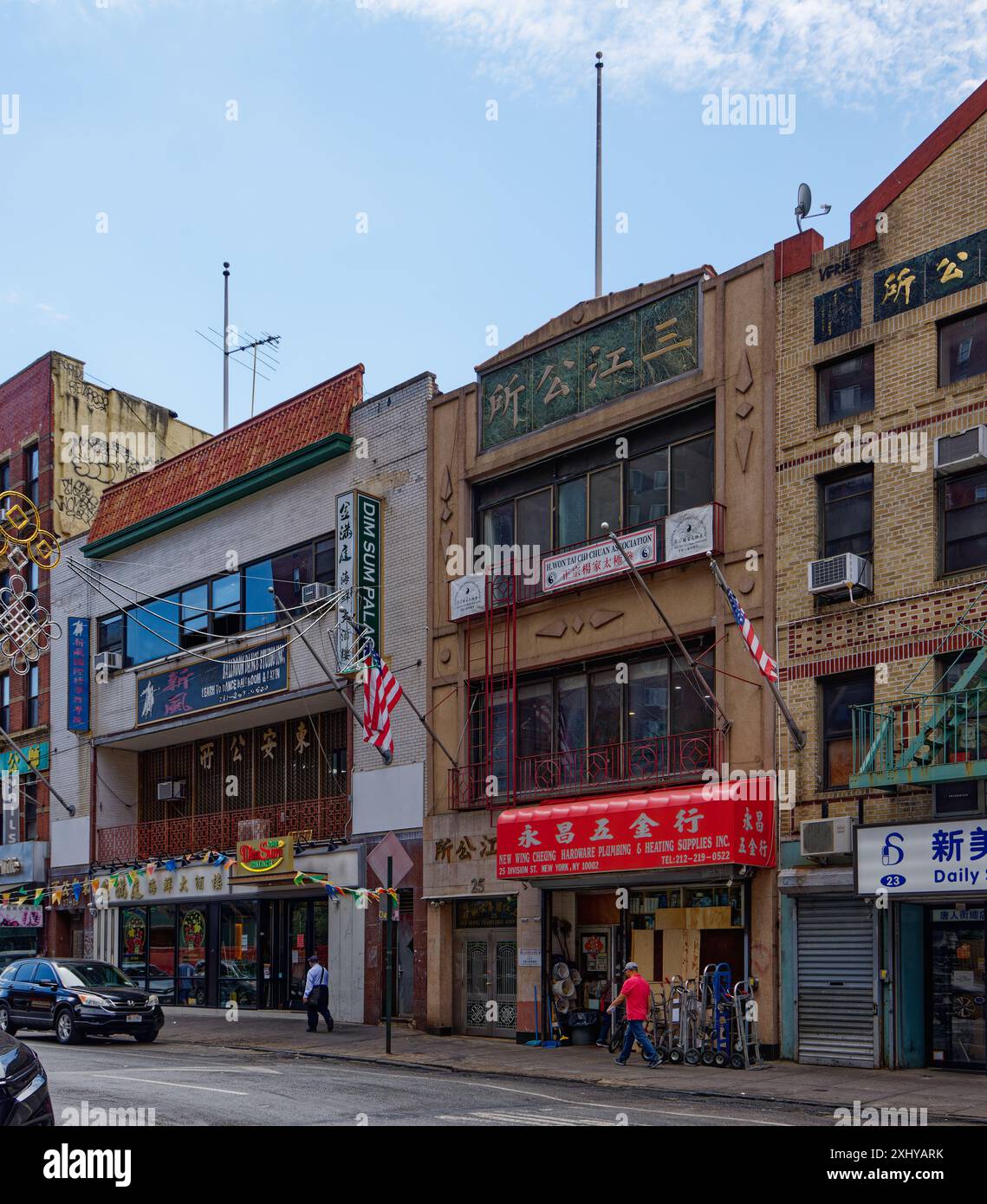 NYC Chinatown: private club and stores buildings on Division Street ...