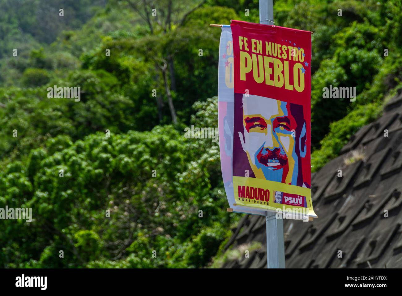 Billboards and murals in the streets of Caracas, campaigning for ...