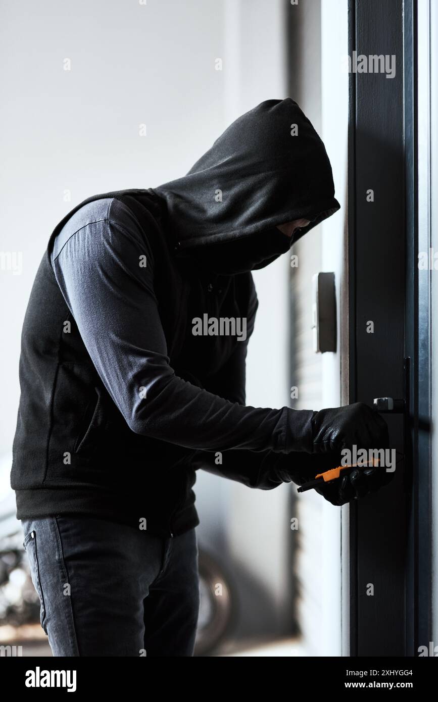 Home, door and man as criminal with tools for robbery, stealing and ...
