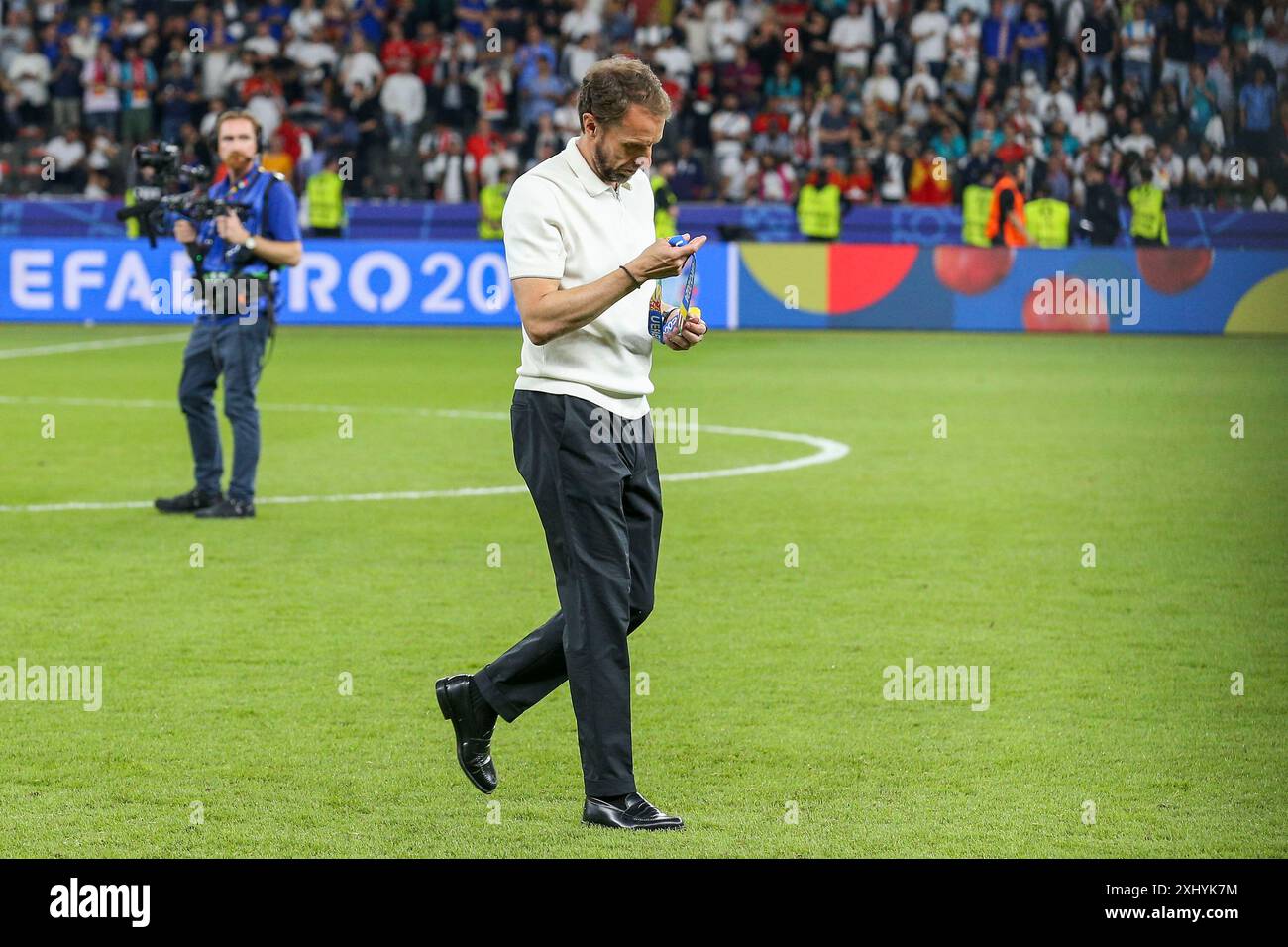 England Manager Gareth Southgate looks at his losers medal dejected ...