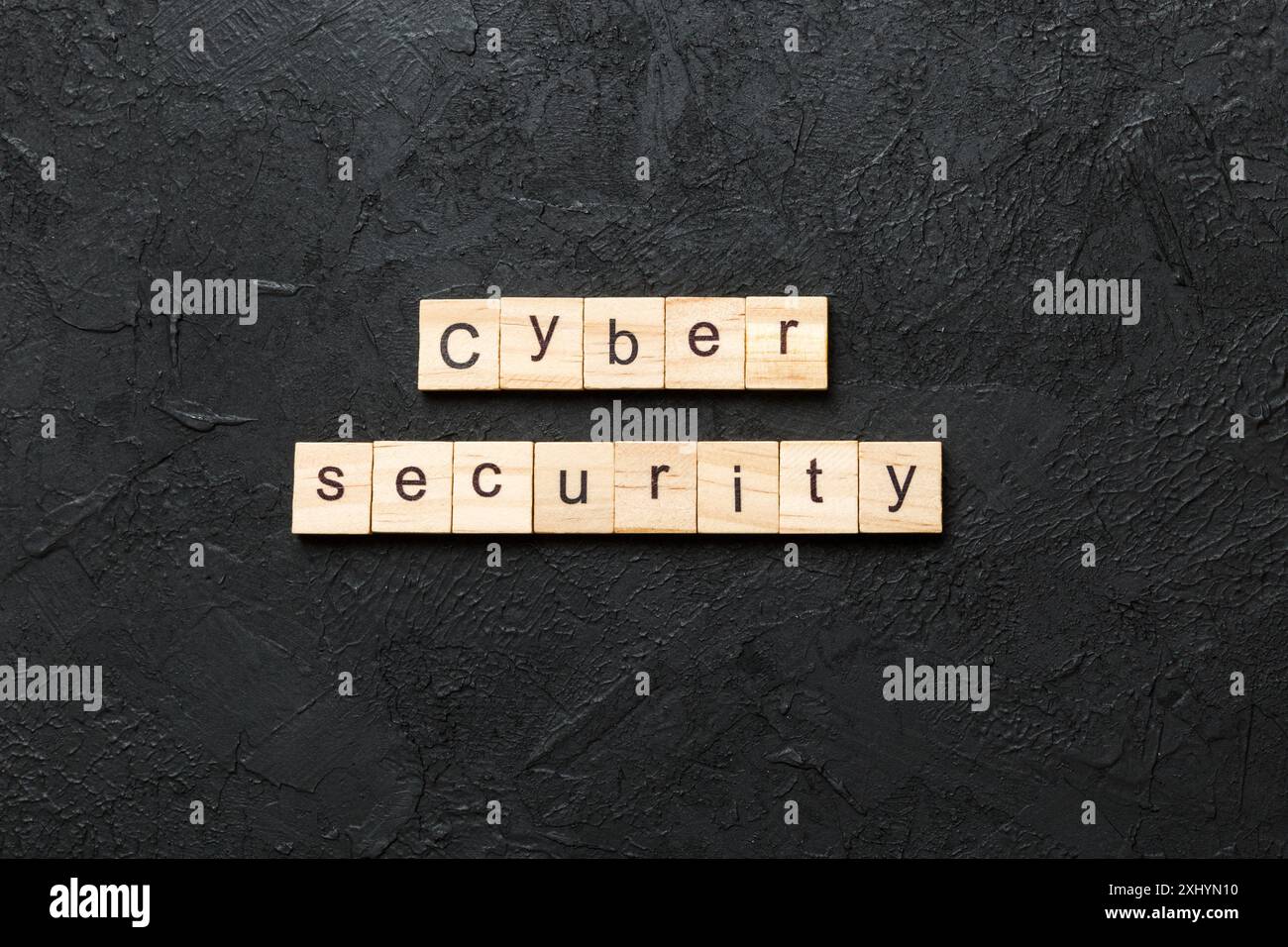 Cyber Security word written on wood block. Cyber Security text on cement table for your desing ...