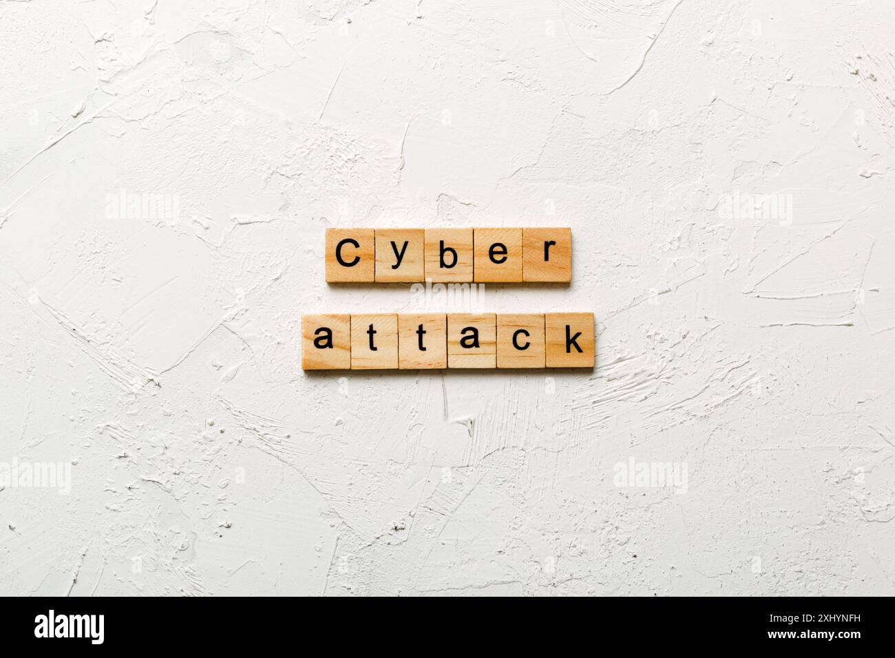 Cyber attack word written on wood block. Cyber attack text on cement ... Cyber attack word written on wood block. Cyber attack text on cement ...