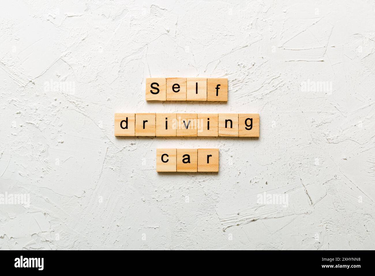Self-driving car word written on wood block. Self driving car text on ...
