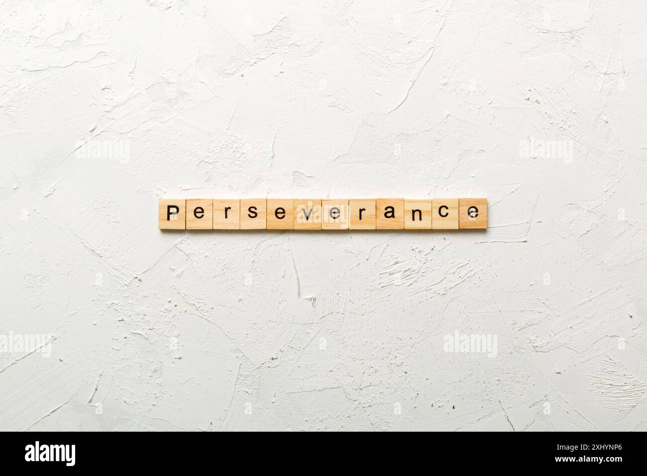 perseverance word written on wood block. perseverance text on table ...