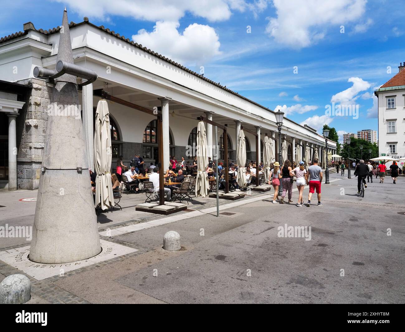 Outdoor cafes in the colonnade along the Ljubljanica River at the ...