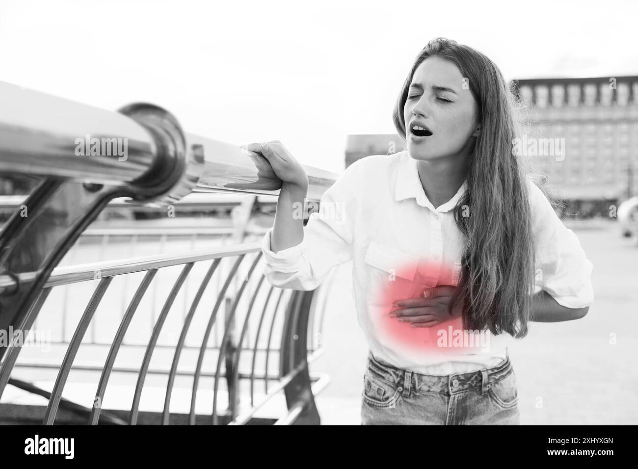 Heart attack. Woman suffering from severe pain in chest outdoors Stock ...