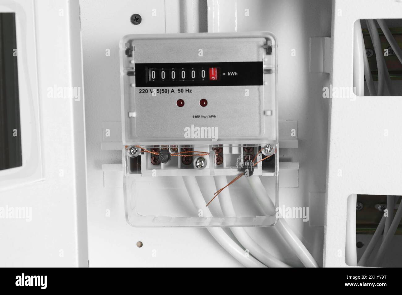 Electric meter and wires in fuse box. Energy measuring device Stock ...