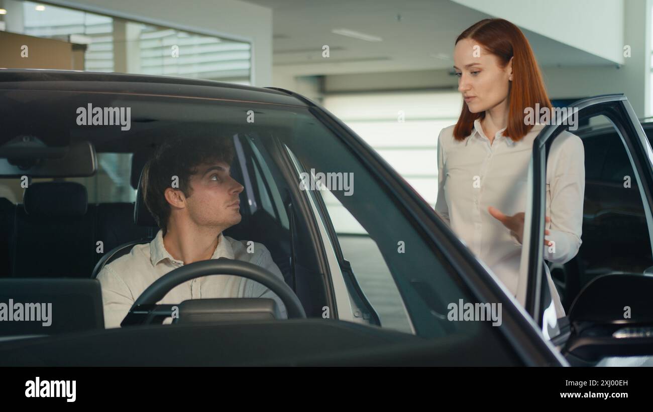 Manager auto salon presenting new hi-res stock photography and images ...