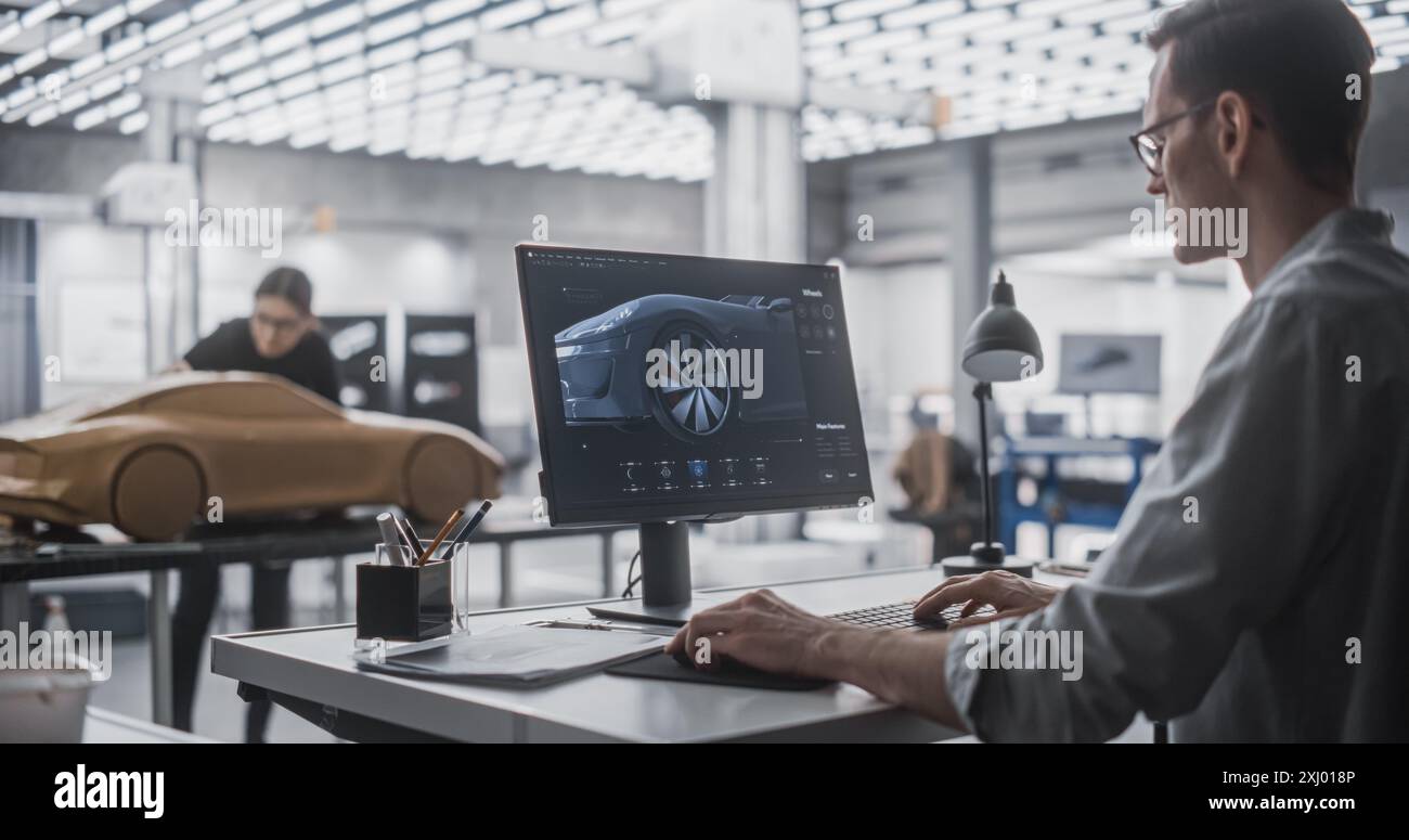 Automotive Designer and Modeler Working as a Team on Creating a ...