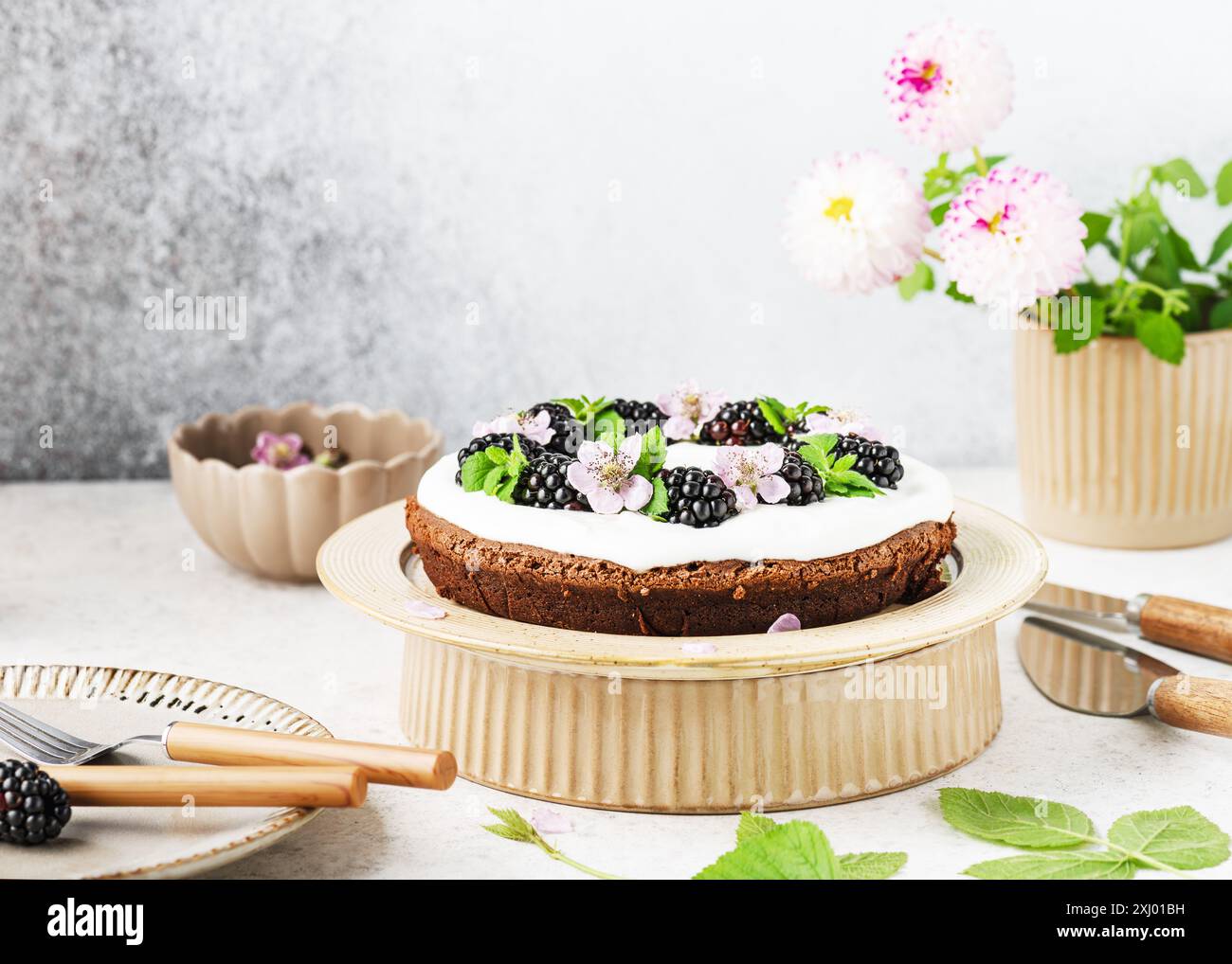 Delicious dark chocolate cake with mascarpone cream decorated with ...