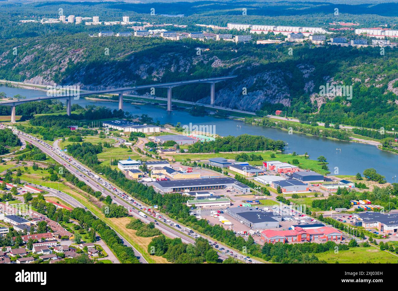 An aerial view of a large motorway bridge crossing a river outside ...