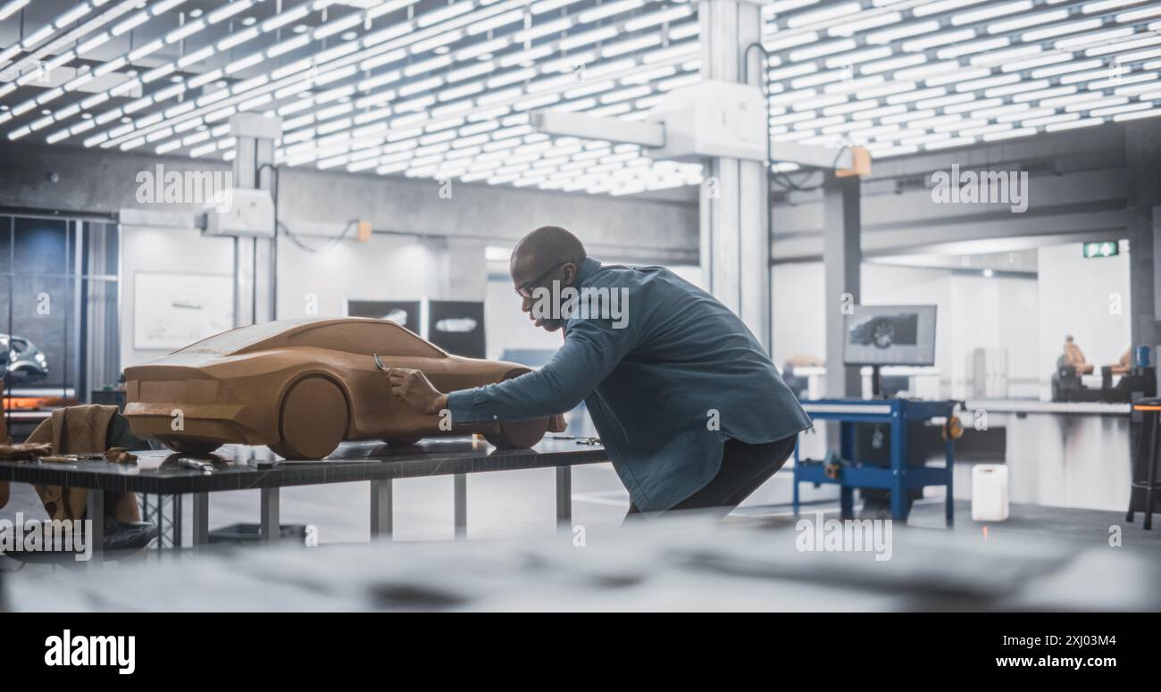African Automotive Designer Using a Spatula to Create a Prototype Car ...