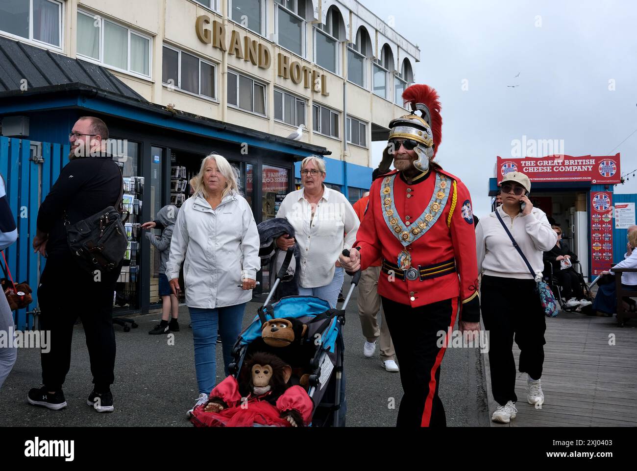 Street character Sam Peters known as the Monkey Man walking along the ...