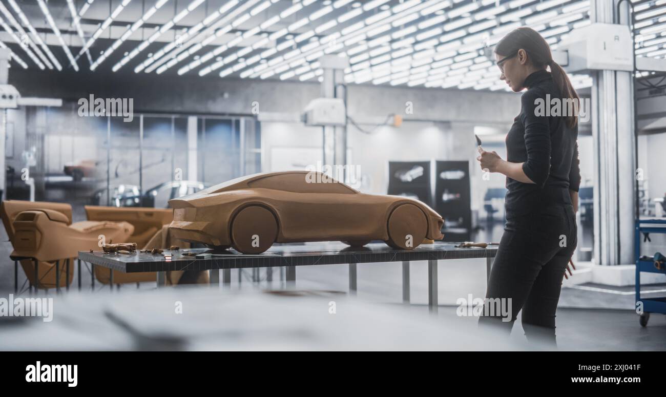 Portrait of a Young Automotive Artist Making Final Strokes on Her ...