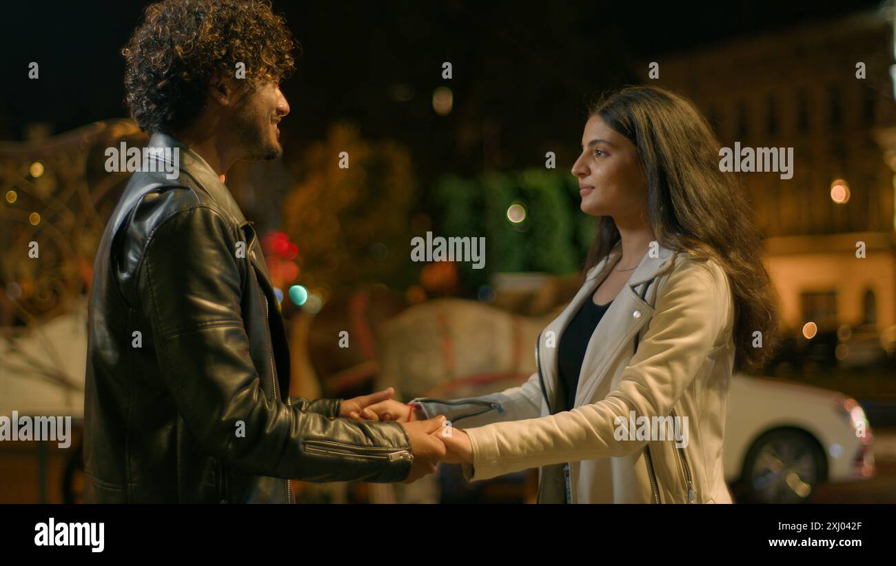 Arabian ethnic couple love dating holding hands touch foreheads ...