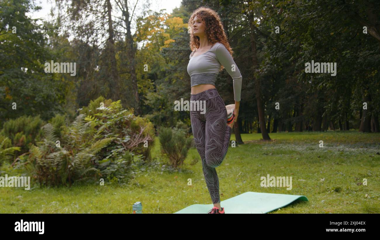 Athletic girl warms up joints hi-res stock photography and images - Alamy