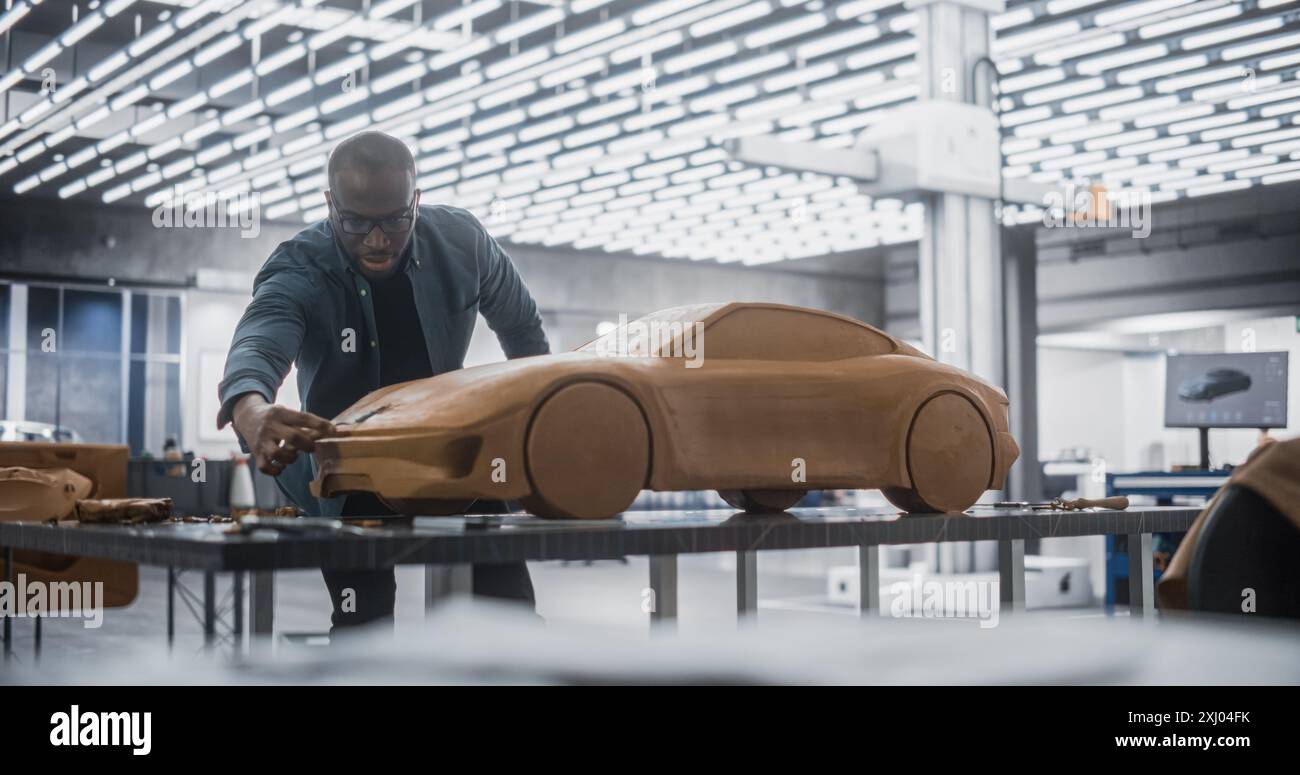African Automotive Designer Working on a Prototype Car Out of Polymer ...