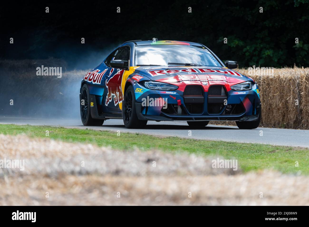 2024 BMW M4 G82 drift car driving up the hill climb track at the ...