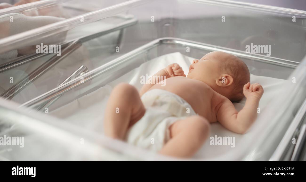 Cute Emotional Newborn Little Infant Lying in Hospital Cot. Funny ...