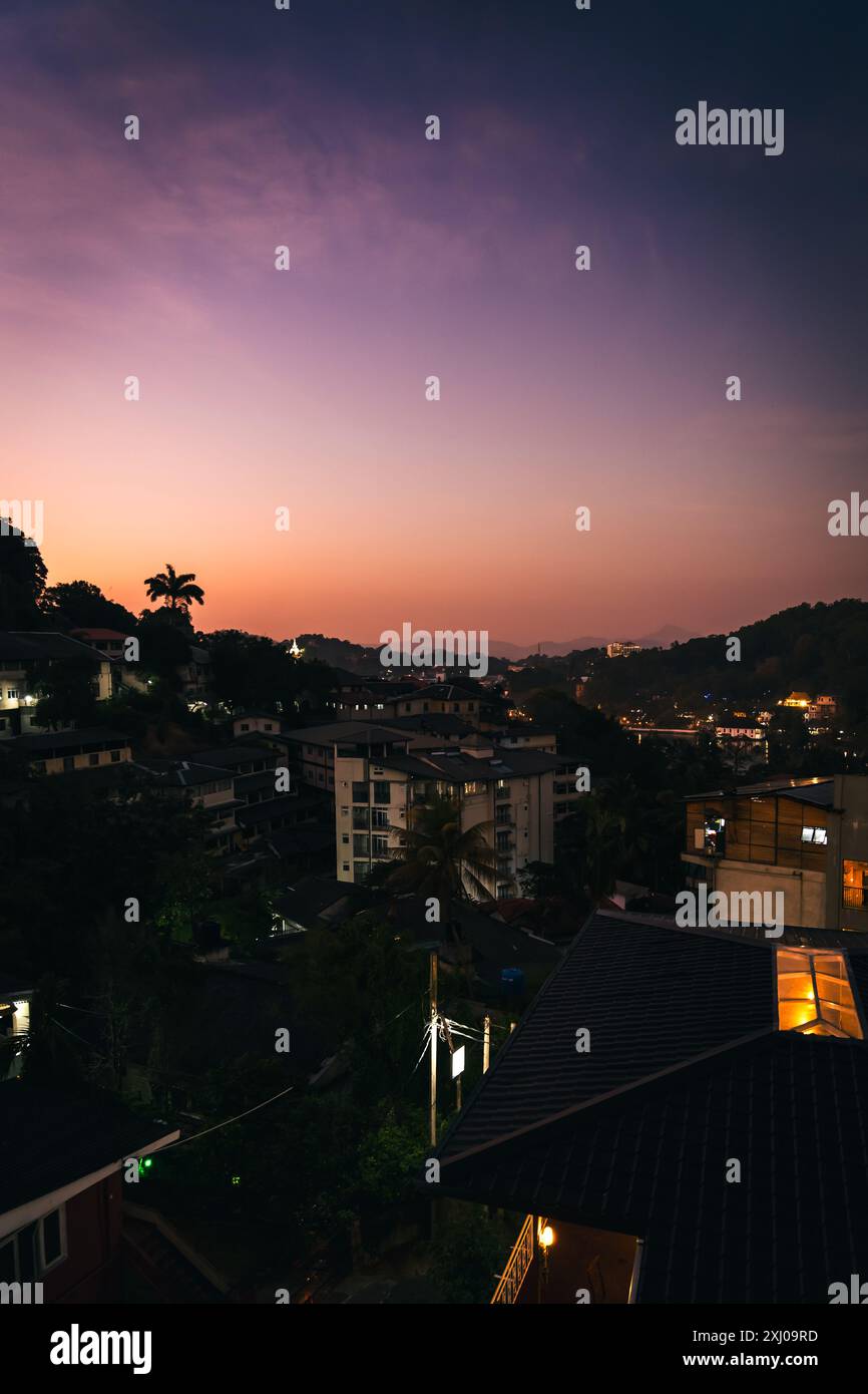 A night view of Kandy, Sri Lanka. The city is illuminated by lights ...