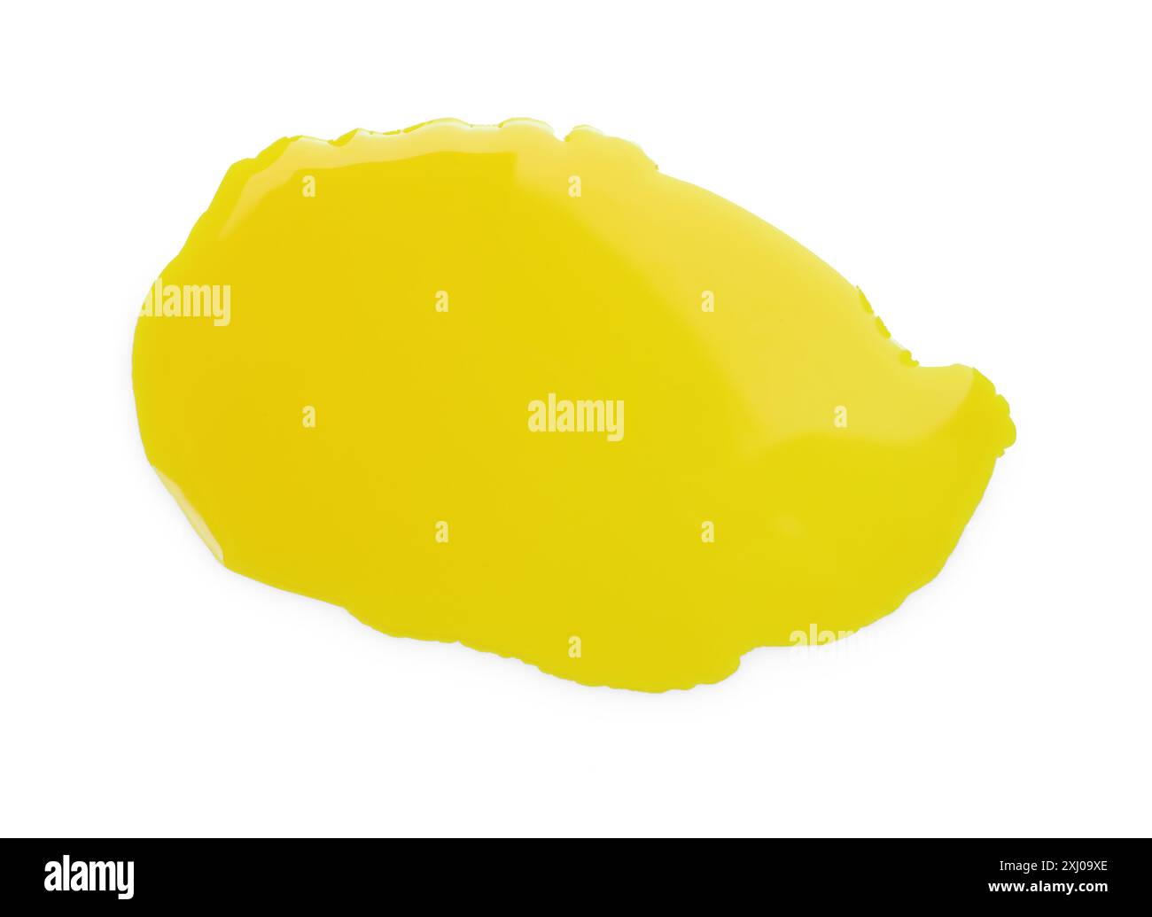 Blot of yellow printer ink isolated on white Stock Photo - Alamy