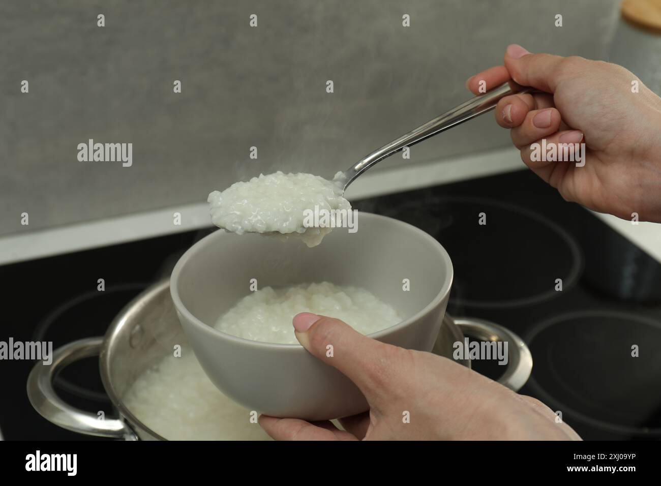 Asian woman putting tasty hi-res stock photography and images - Alamy
