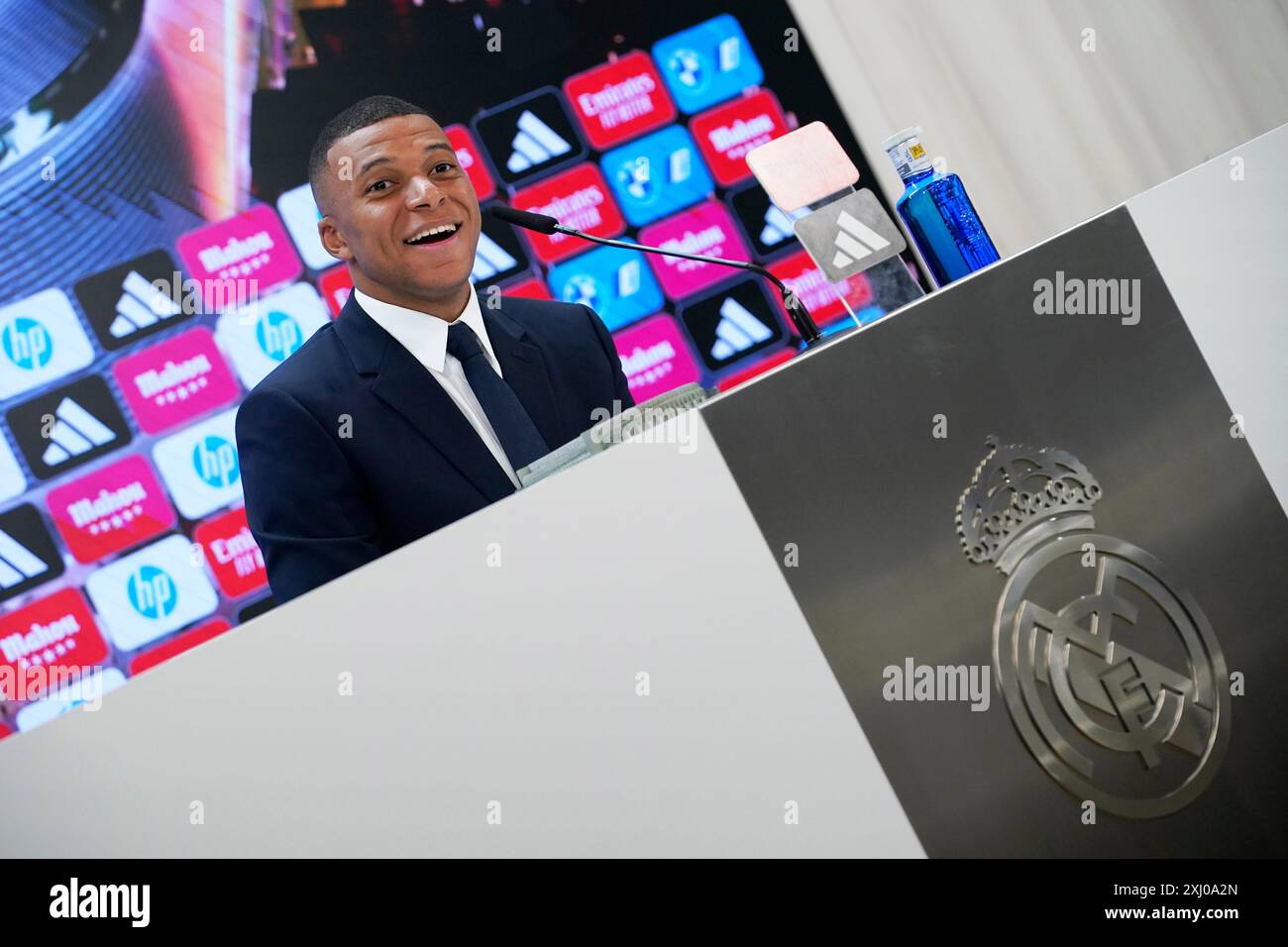 Kylian Mbappe, of France, smiles during a news conference after being ...