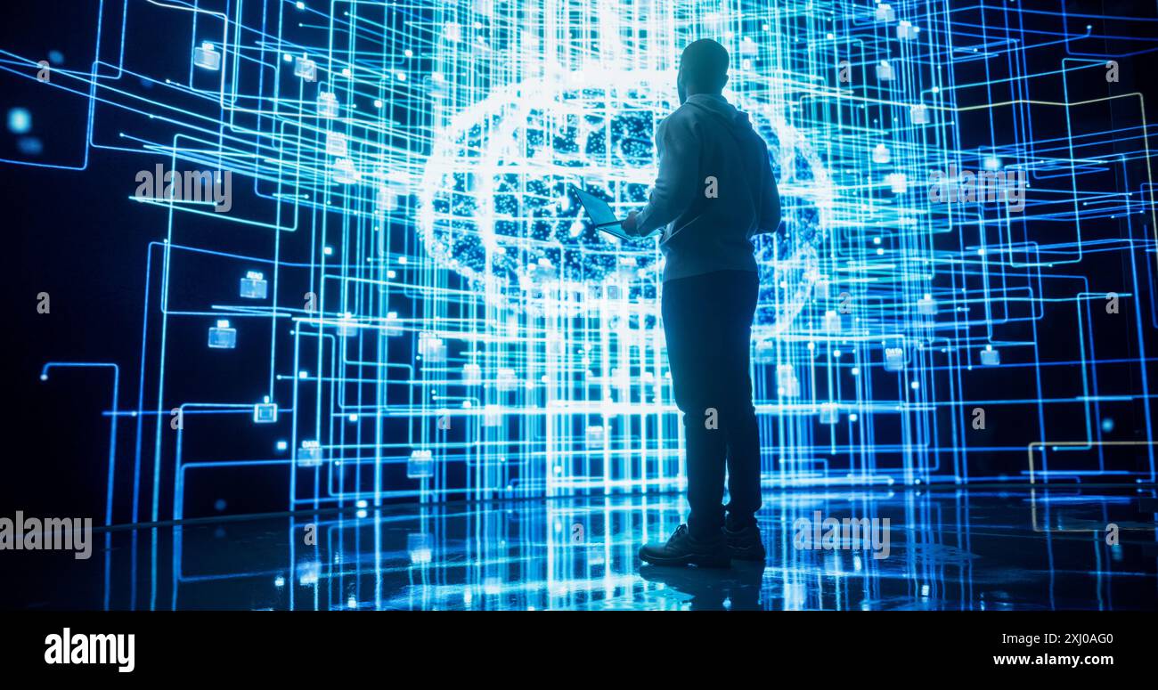 Back View of Young Man Looking at a Big Screen with Neural Network 3D ...