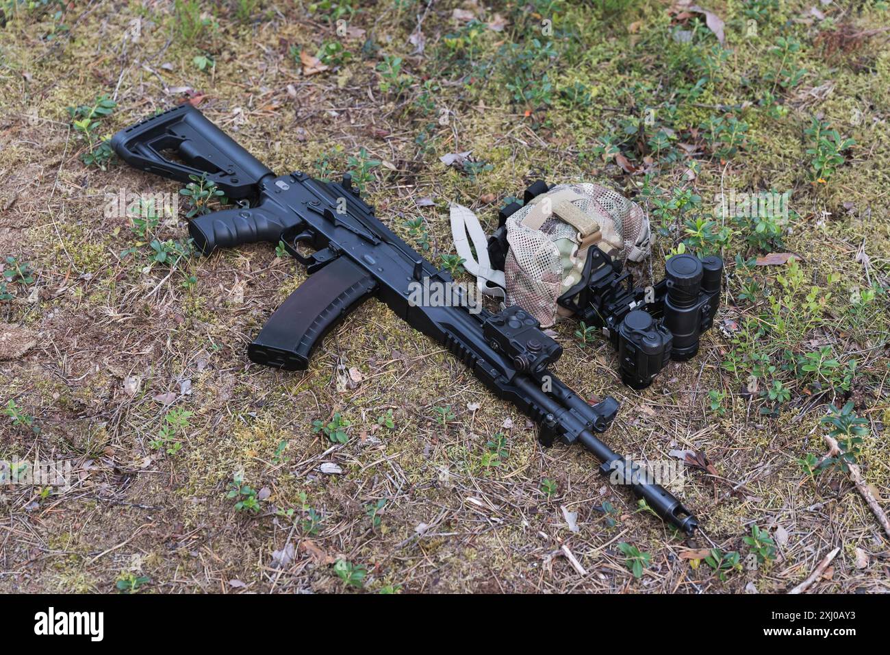 A modern Russian assault rifle AK 12 with a laser sight and a night ...