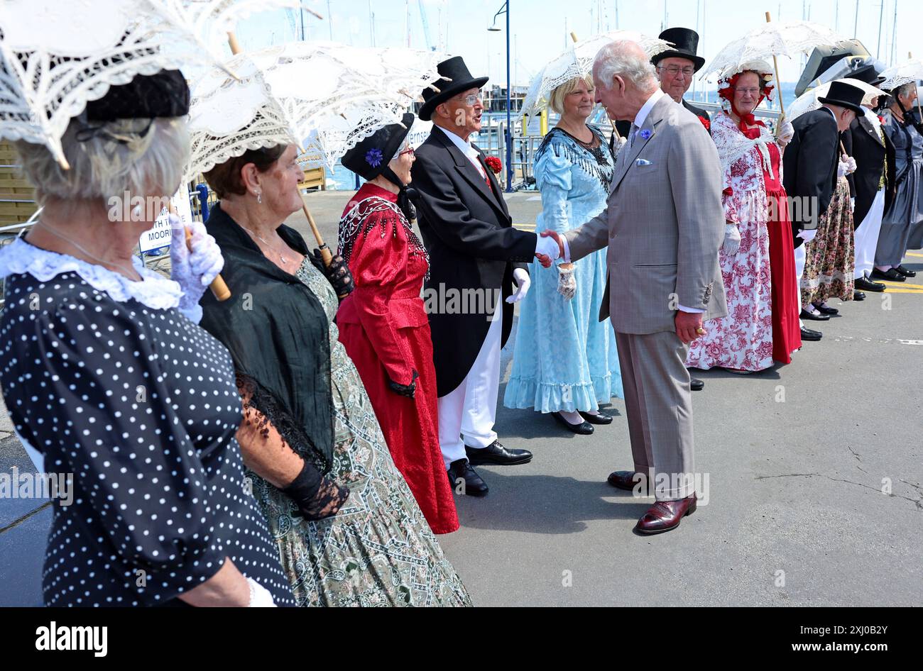 King Charles III meeting Guernsey Dancers while touring a showcase of ...