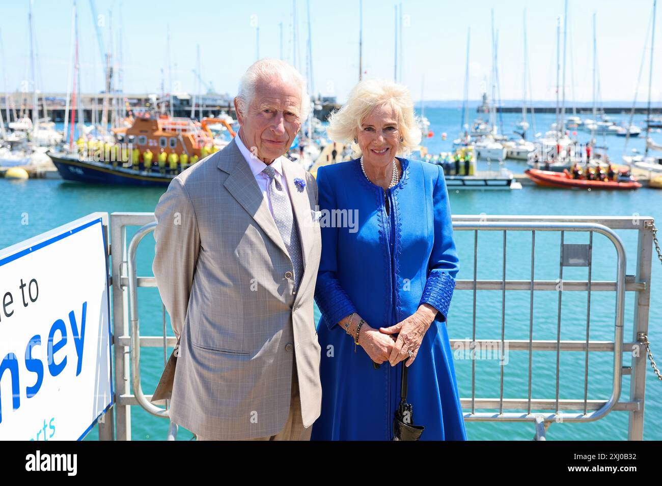 King Charles III and Queen Camilla pose in front of the RNLI Lifeboats ...