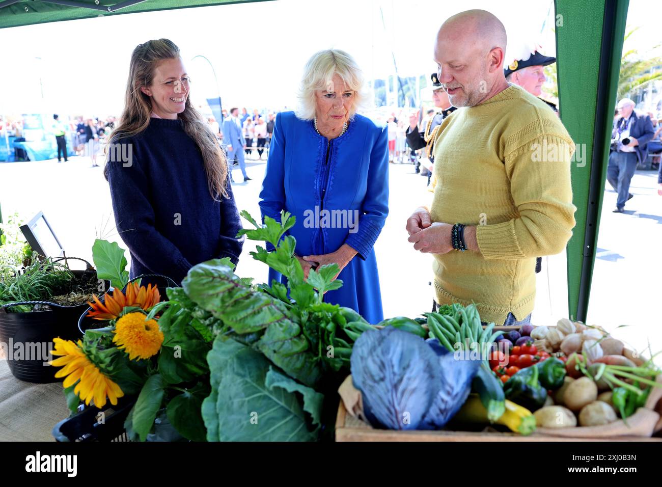 Queen Camilla views local produce while touring a showcase of Guernsey ...
