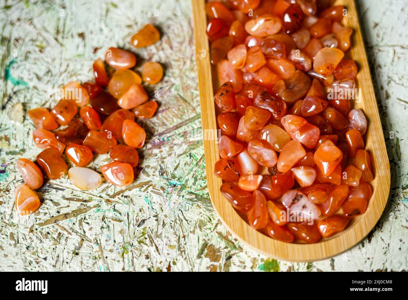 Orange raw carnelian stones. Close up Stock Photo - Alamy