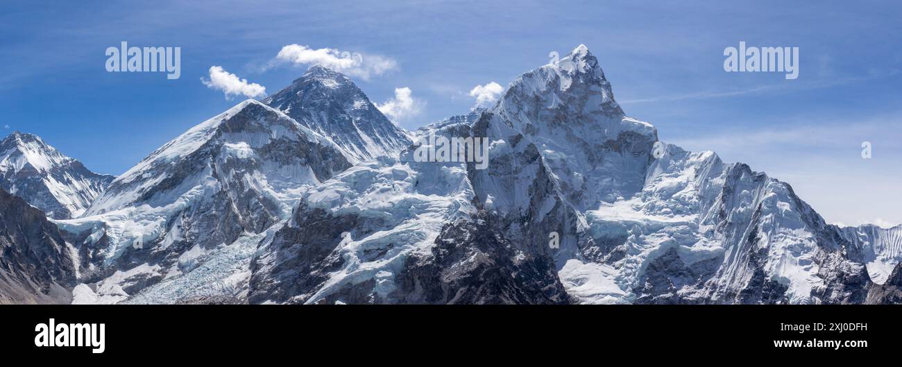 Mt Everest and Nuptse. Blue sky. Panoramic view. Himalayan mountains ...